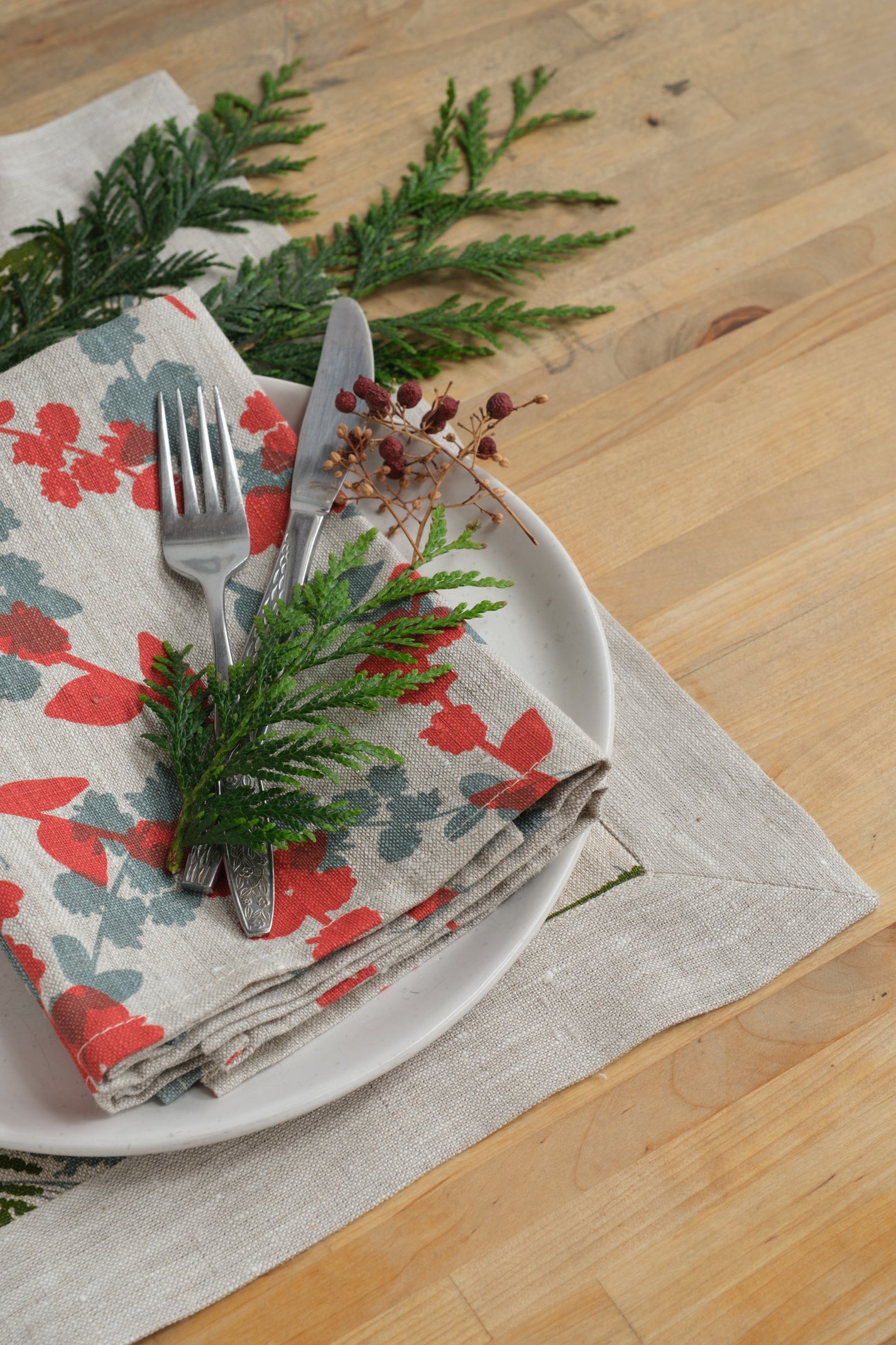 Napkin Set featuring Wattle Sprigs in Guava and Storm – Femke Textiles